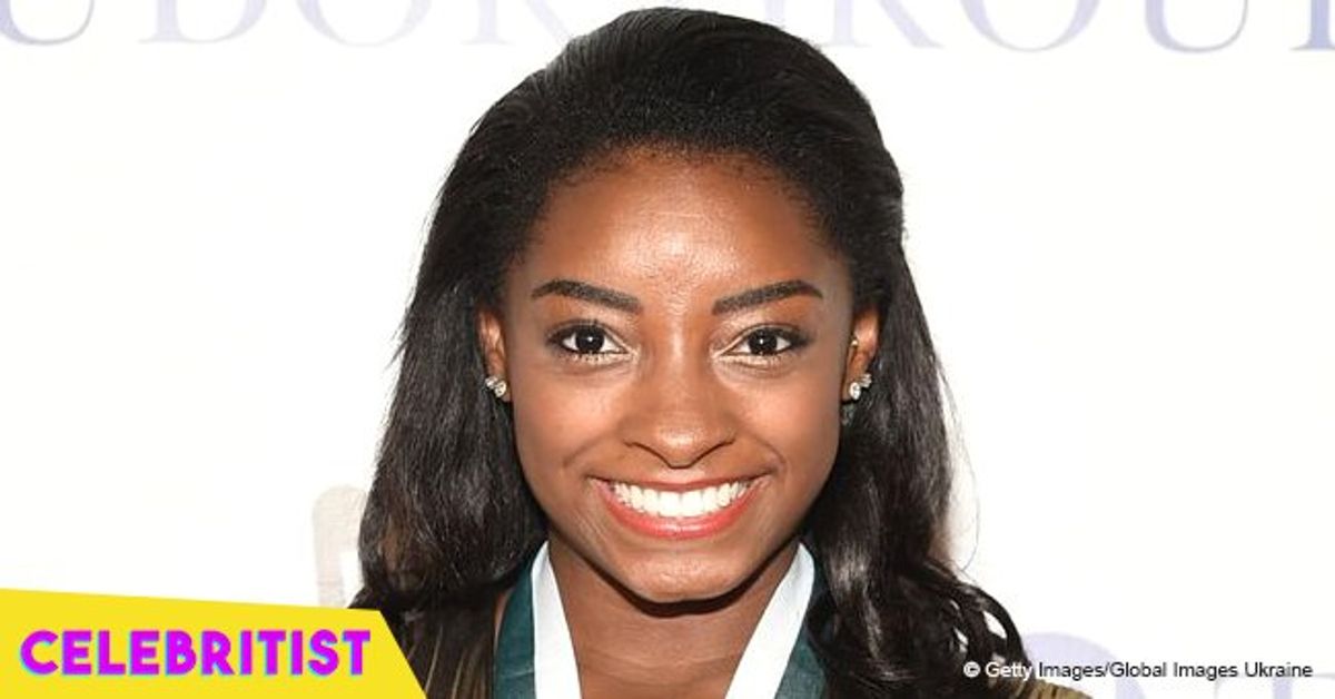Simone Biles flaunts curves in pink swimsuit, lounging in the sun with ...