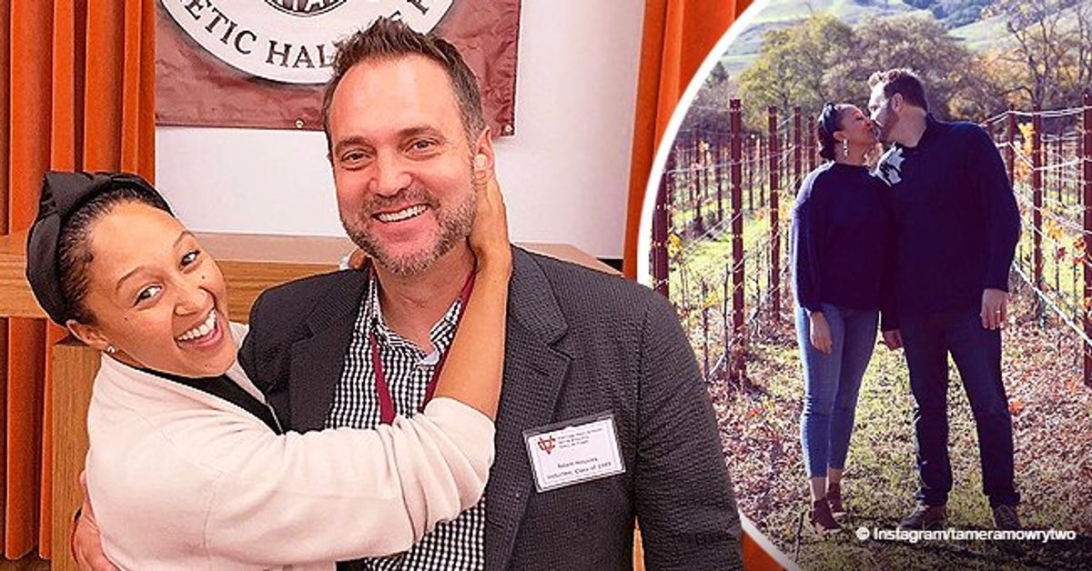 Tamera Mowry Of The Real Gives Husband Adam Housley A Kiss At Their