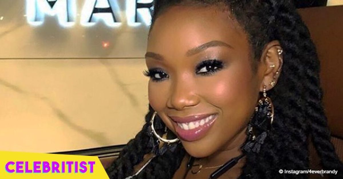 Brandy's daughter flaunts her new hairstyle while wearing bright red ...