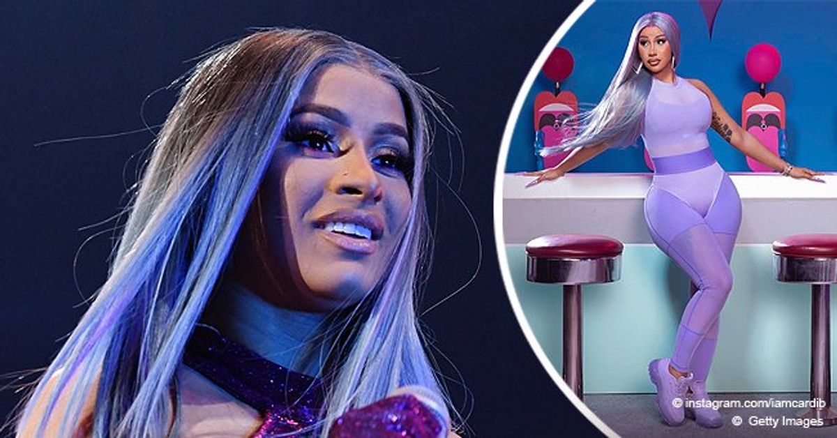 Cardi B Showcases Her Flexibility as She Poses In a Purple Jumpsuit ...