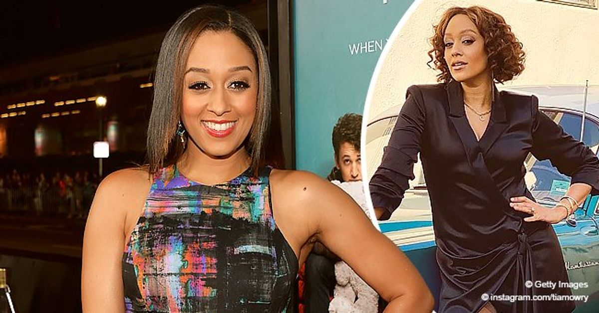 Tia Mowry Makes Hearts Go Wild Posing Next to a Car in a Black Silk ...