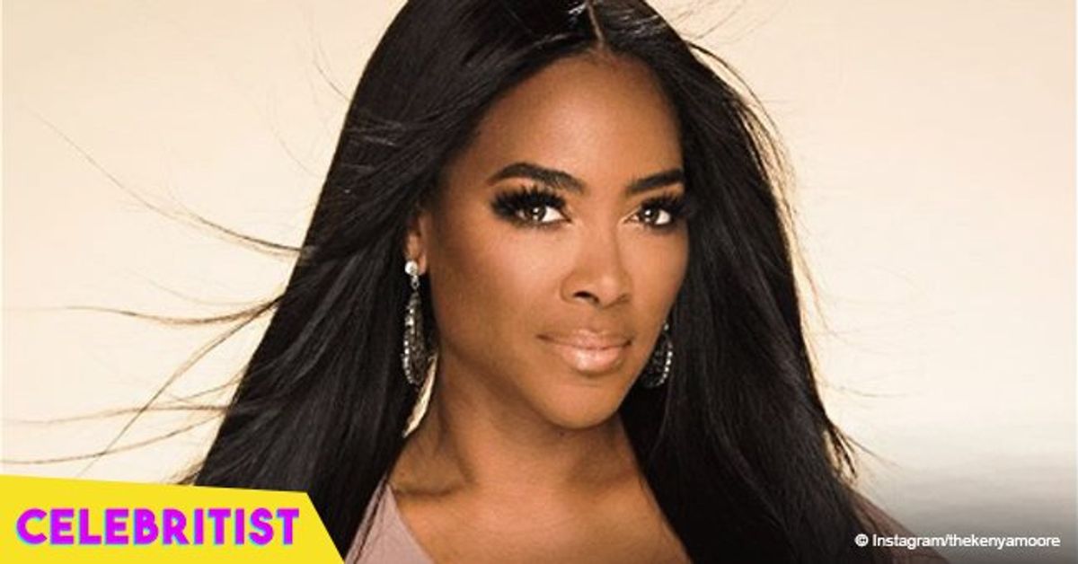 Kenya Moore shares photo with dad holding a cigar after not inviting ...
