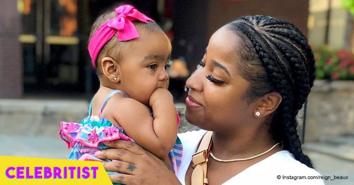 Toya Wright's daughter baby Reign is 'living her life' in miniature red ...