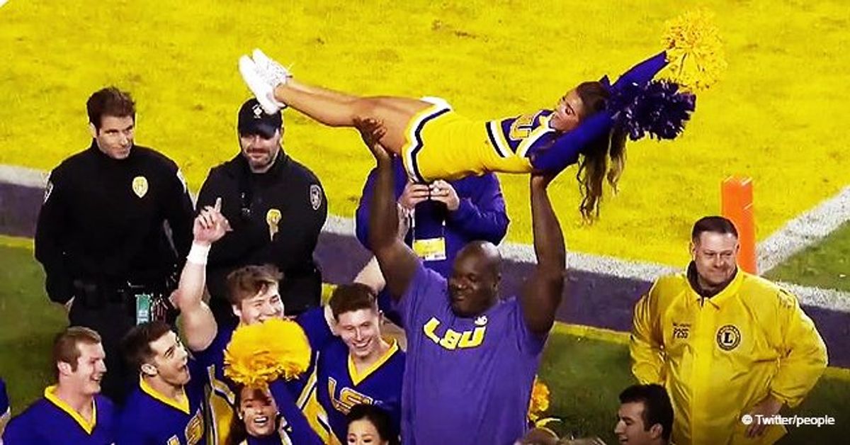 Shaquille O'Neal Lifts Cheerleader over His Head during Football Game ...