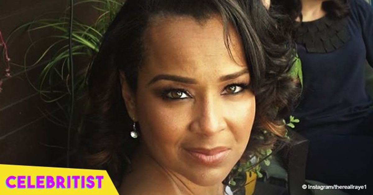Lisa Raye, 51, stuns in figure-hugging white skirt & top in recent photo