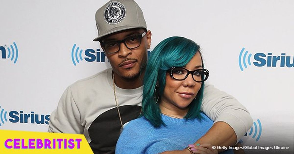 T.I. slammed after being caught on camera with another woman