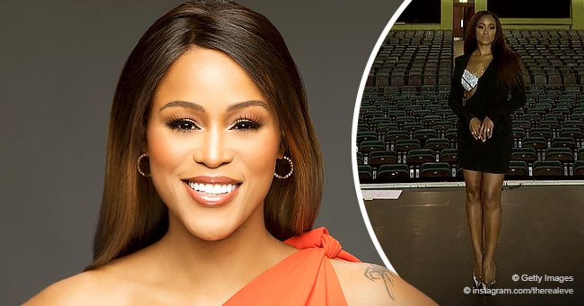 Eve Stuns in a Black Midi-Dress as She Poses in a Beautiful Empty ...