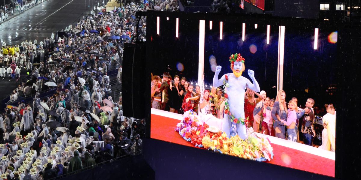 Who Is the Man Painted Blue at the Paris Olympics Opening Ceremony? His ...