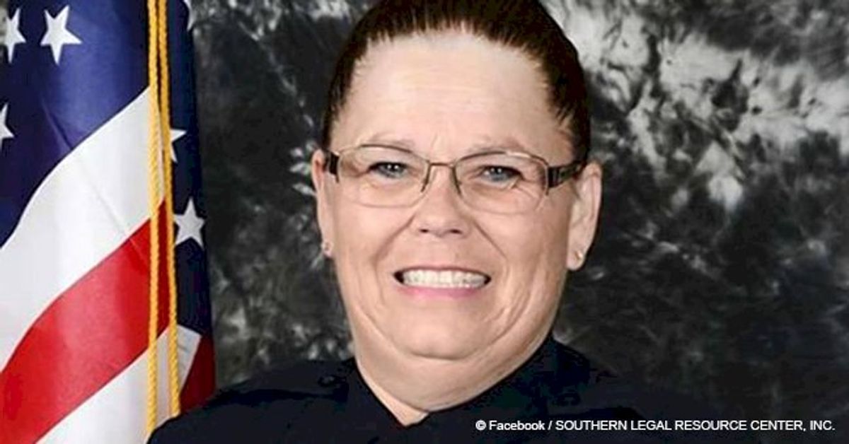 Police veteran fired after neighbor complains about a flag in the woman ...