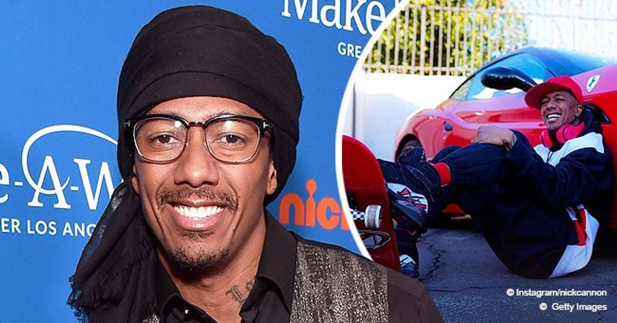 Nick Cannon Is All Smiles in a Cool Outfit While Posing Next to His ...