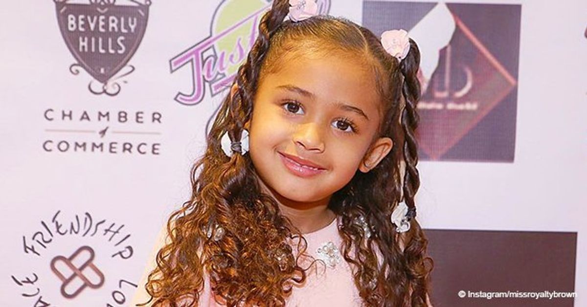 Royalty Brown steals the show in stylish dress as she shines in red ...