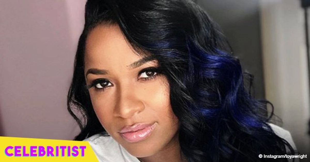 Toya Wright's daughter steals hearts in white dress at her christening