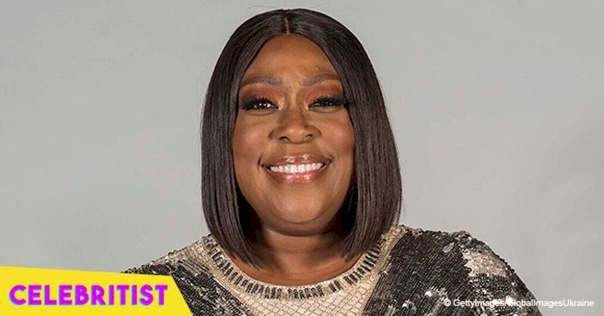 Loni Love shows off slimmer curves in peach, silky midi dress after ...