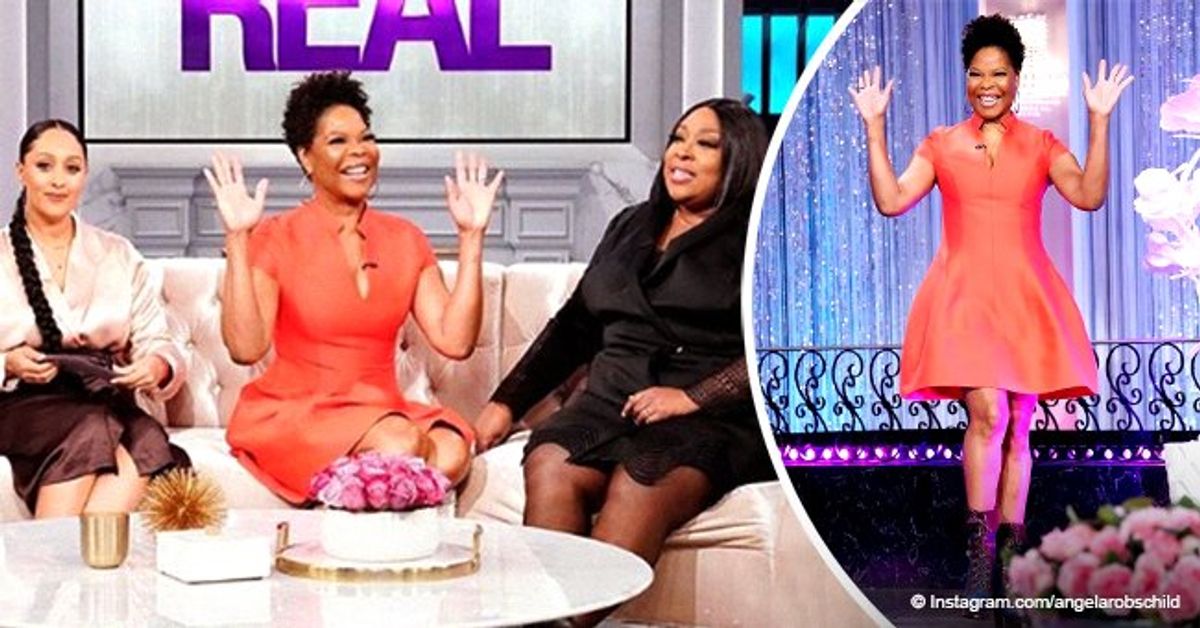 Angela Robinson from HAHN Stuns in Short Orange Dress & Boots during ...