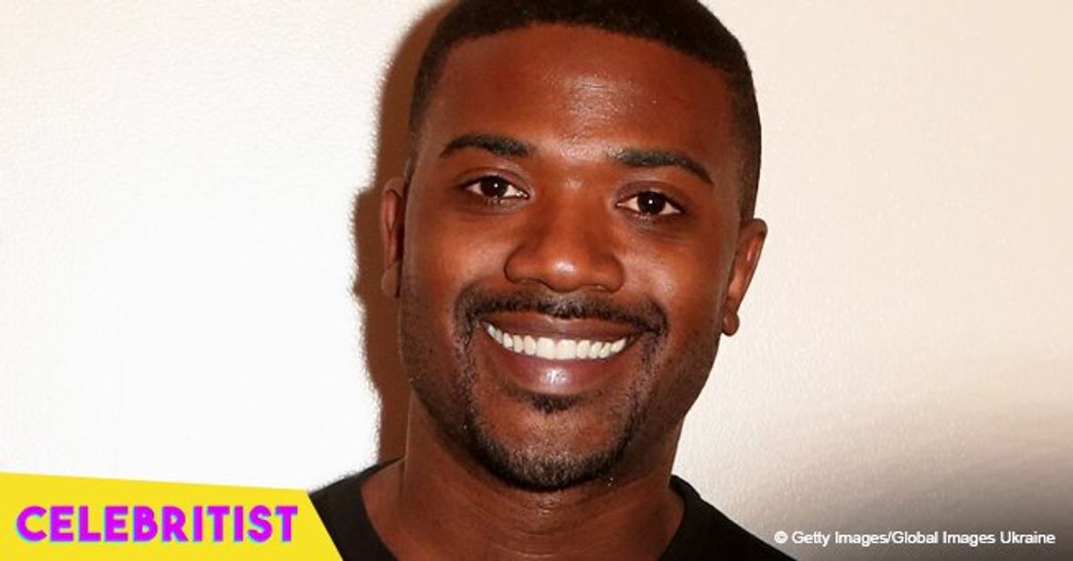 Ray J holds baby daughter as she rocks her curly hair with white bow ...