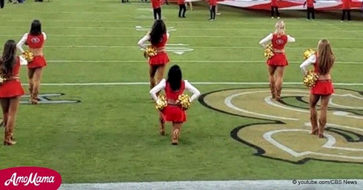 First cheerleader to kneel down during the national anthem to stand up ...