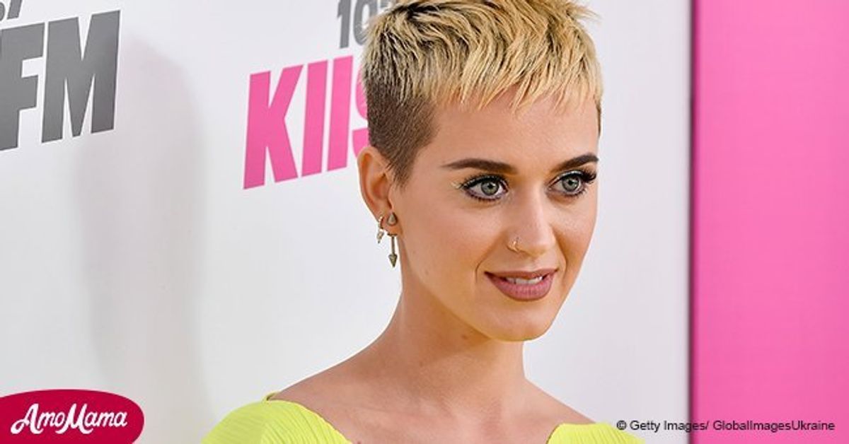 Katy Perry, 33, shows off a new tattoo on her wrist under a multi ...