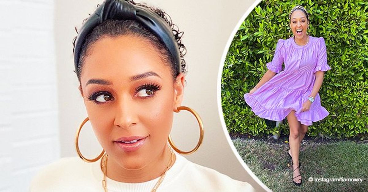 Tia Mowry Poses in Cute Purple Medium Length Dress and Animal Print ...