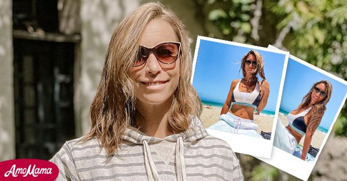 Lyssa Chapman Shows Her Toned Abs in a Deep Plunging Top and White Trousers