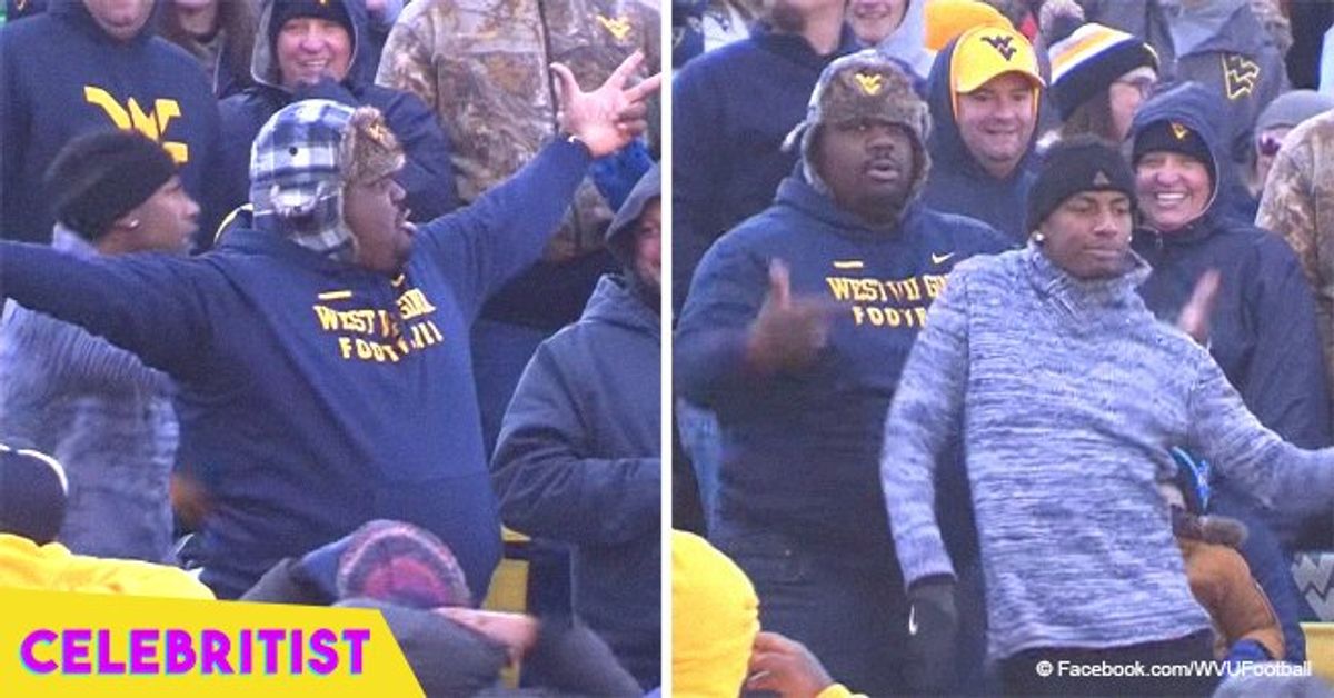 'Strangers' steal the show with hilarious dance-off at football game in ...