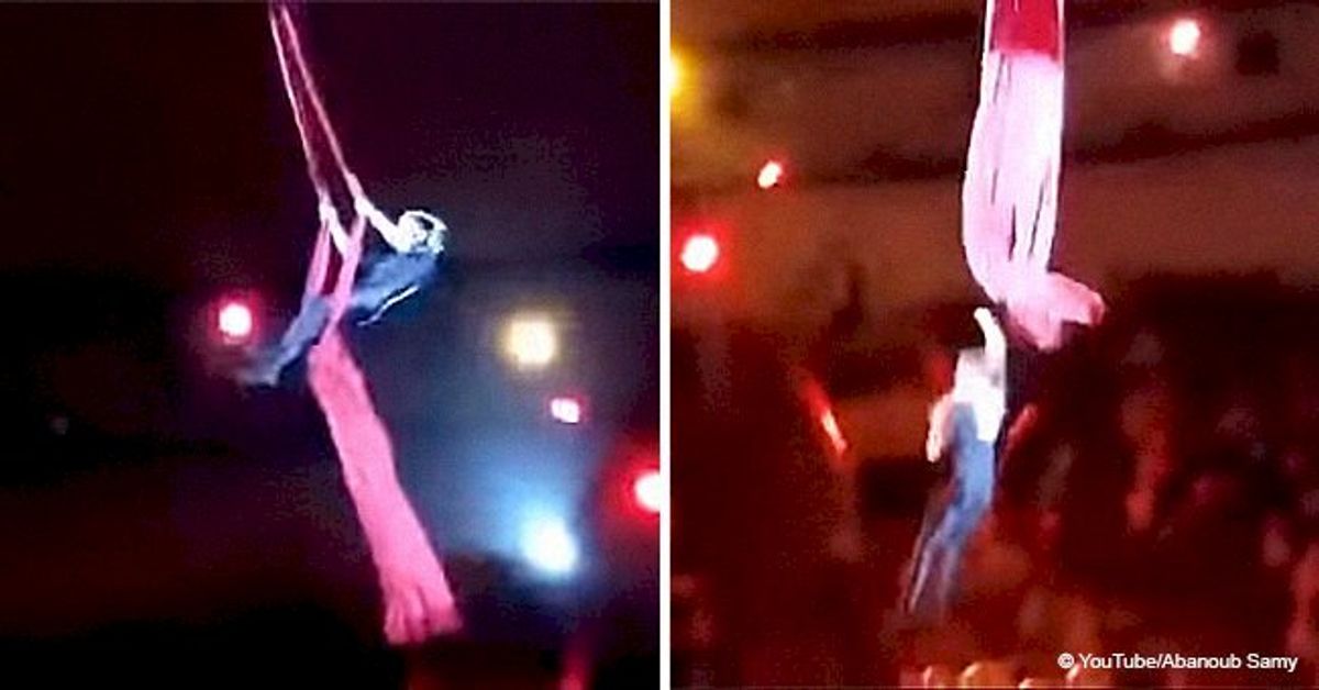 Circus acrobat plummets from a great height to the ground while ...