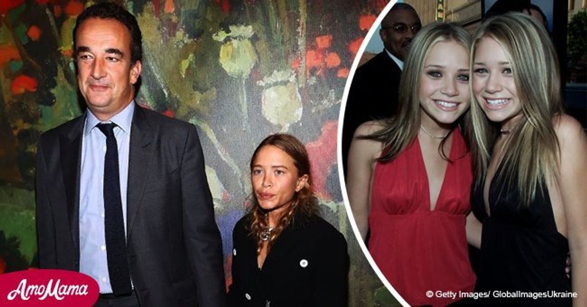 Mary-Kate looks totally minuscule as she poses with her super-sized husband