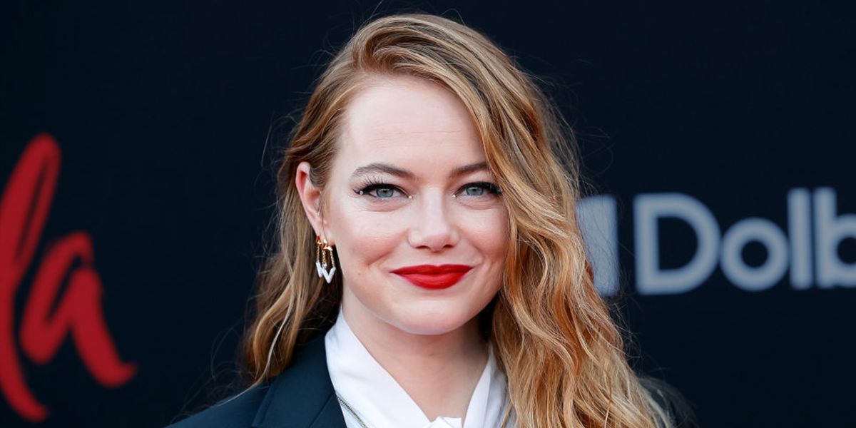 Emma Stone Dazzles in Silver & Turns Heads with Pixie Cut on the Venice ...