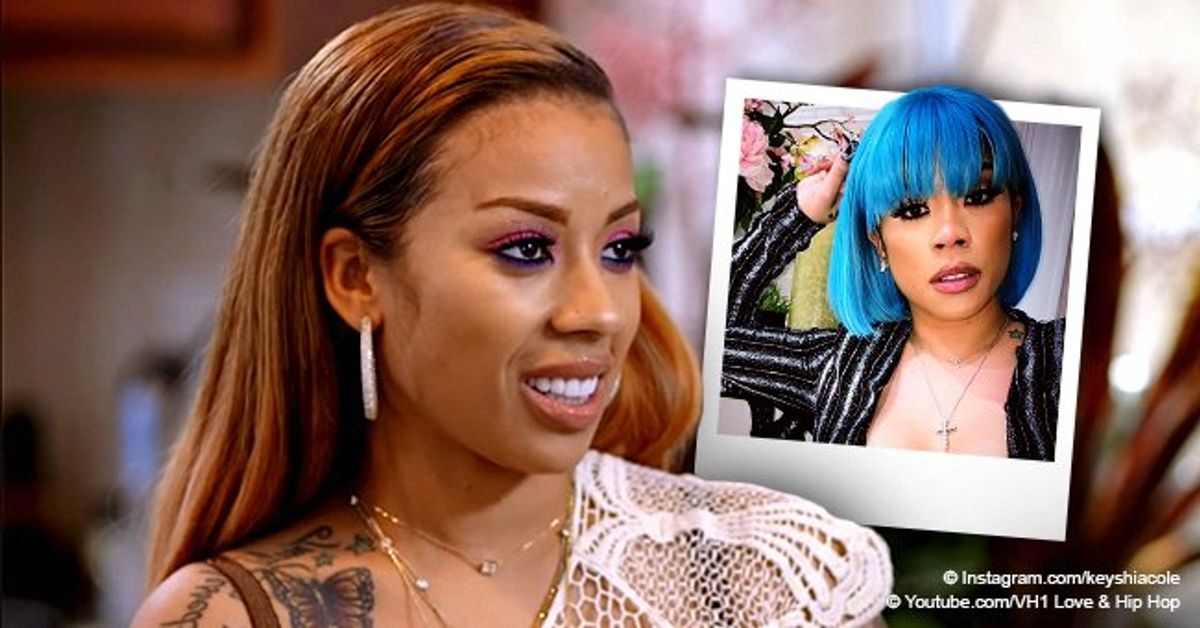 Keyshia Cole Stuns in Plunging Black Outfit as She Debuts Neon Blue ...
